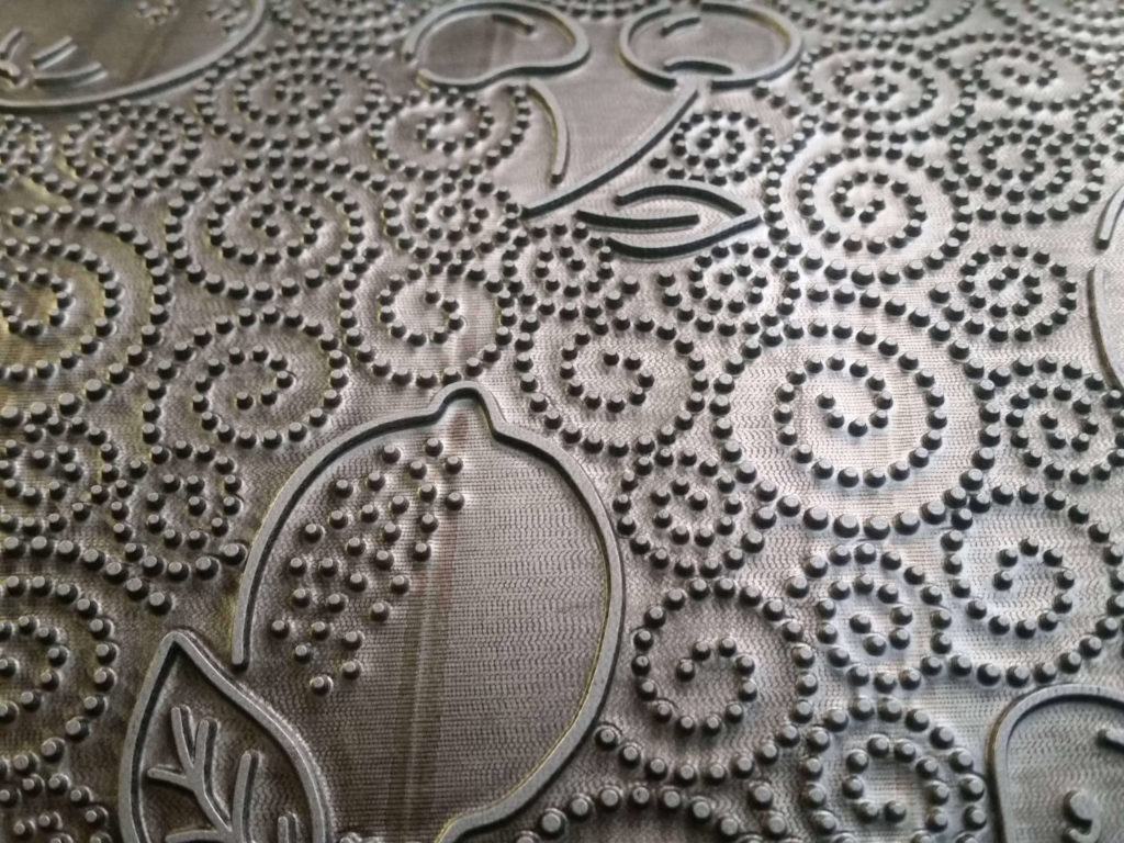 Cleaning printing machines and embossing rollers with cleanLASER